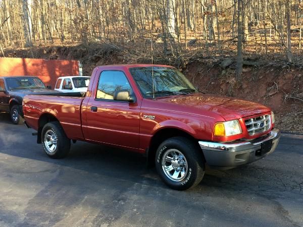 2003 Red Ford Ranger XLT with 70,000 miles